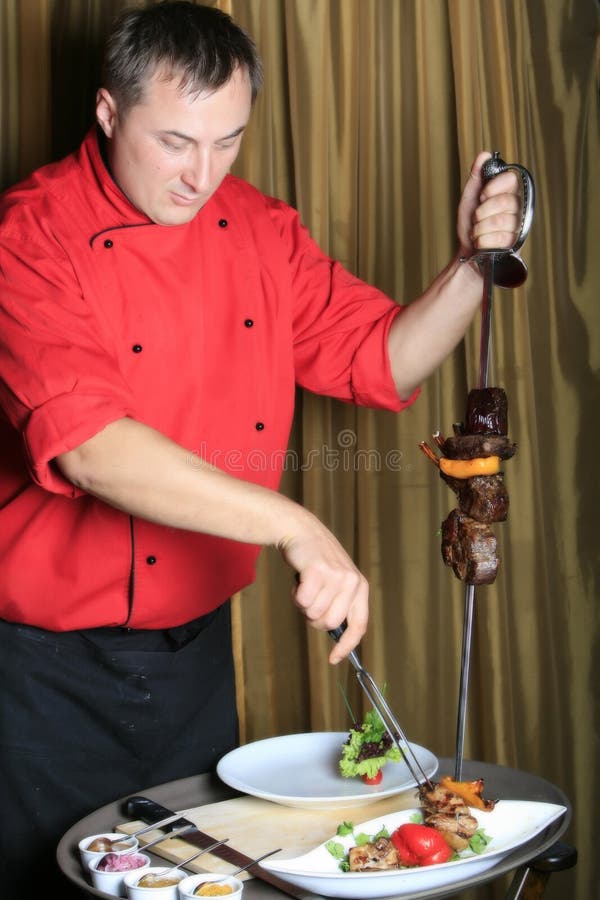 Cook Takes Off the Fried Meat and Green-stuffs Stock Image - Image of ...