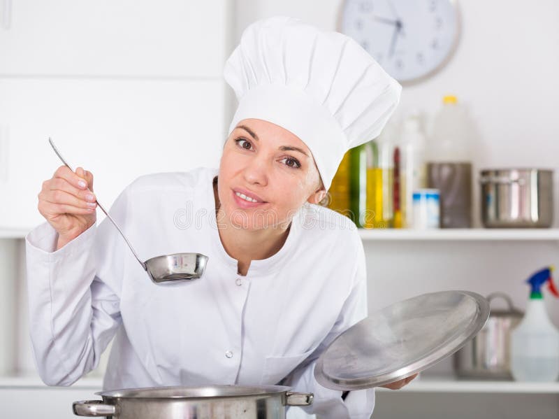 Cook tasting food stock photo. Image of food, checking - 82826164