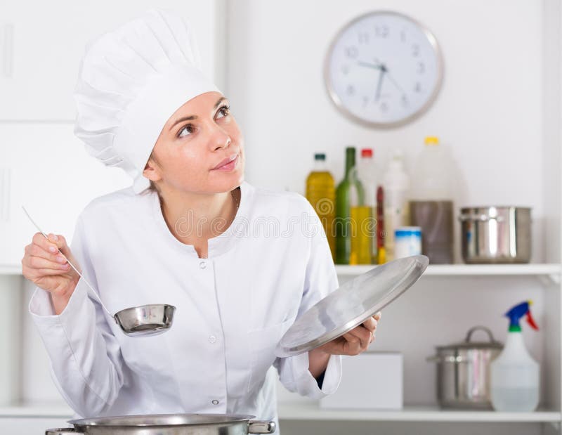Cook tasting food stock photo. Image of girl, lifestyle - 205375986