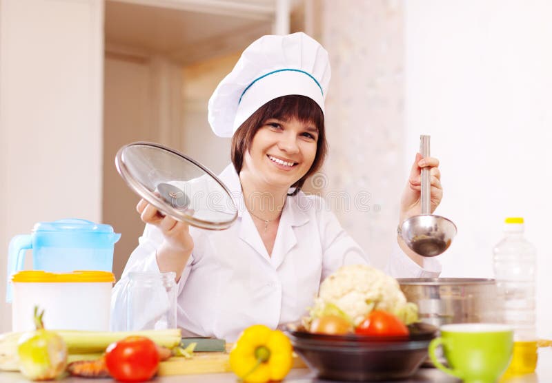Cook in Uniform Cooking in Kitchen Stock Photo - Image of cheerful ...