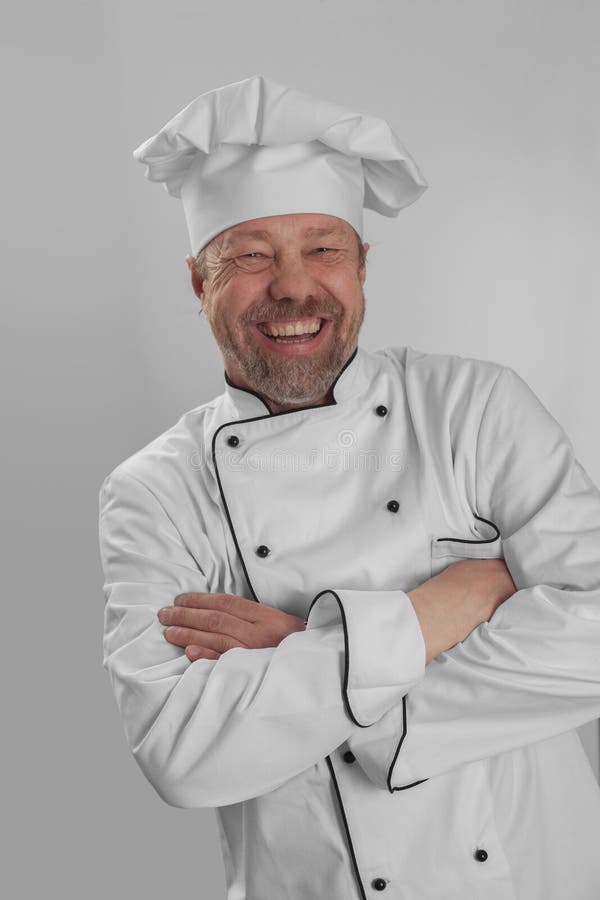 Cook in the White Cap Laughs Stock Photo - Image of baker, happy: 70318472