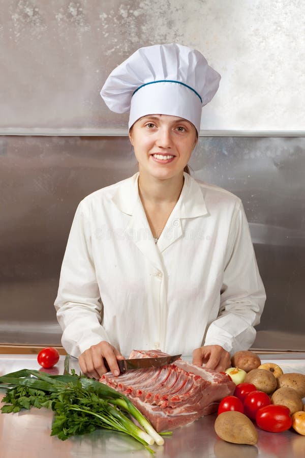 Cook woman cooking meat stock image. Image of knife, female - 21735009