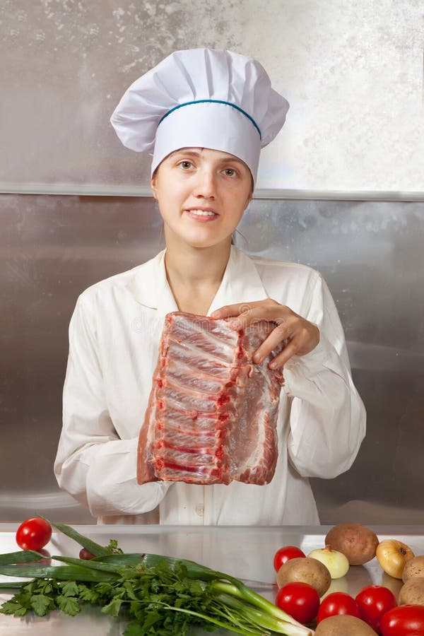 Cook woman with raw meat stock image. Image of home, young - 21805923