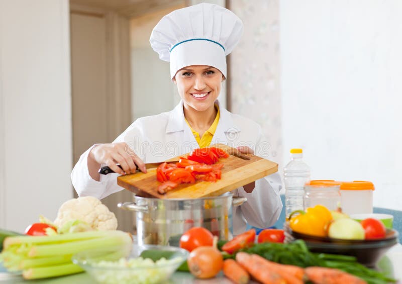 Cook Works with Tomato and Other Vegetables Stock Image - Image of ...