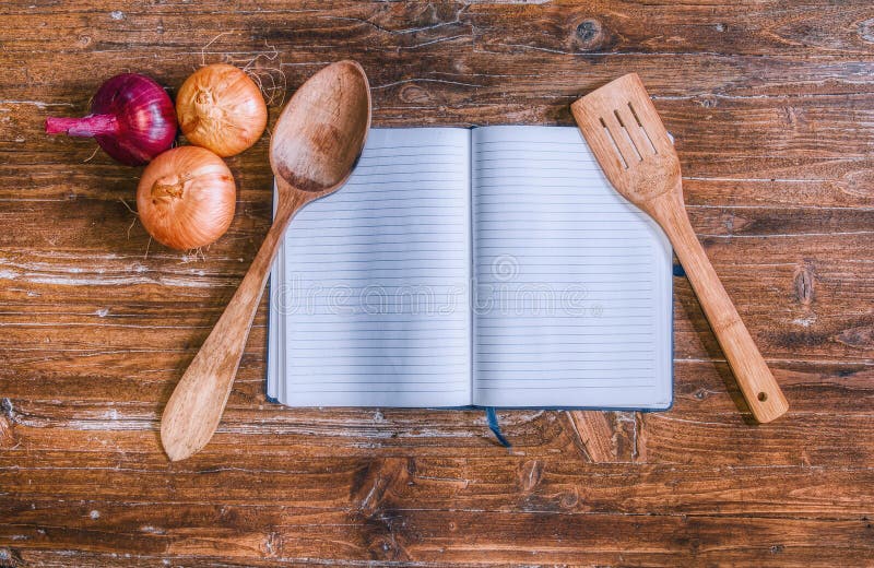 Cookbook on Top of the Wooden Table with Some Onions. Stock Photo ...