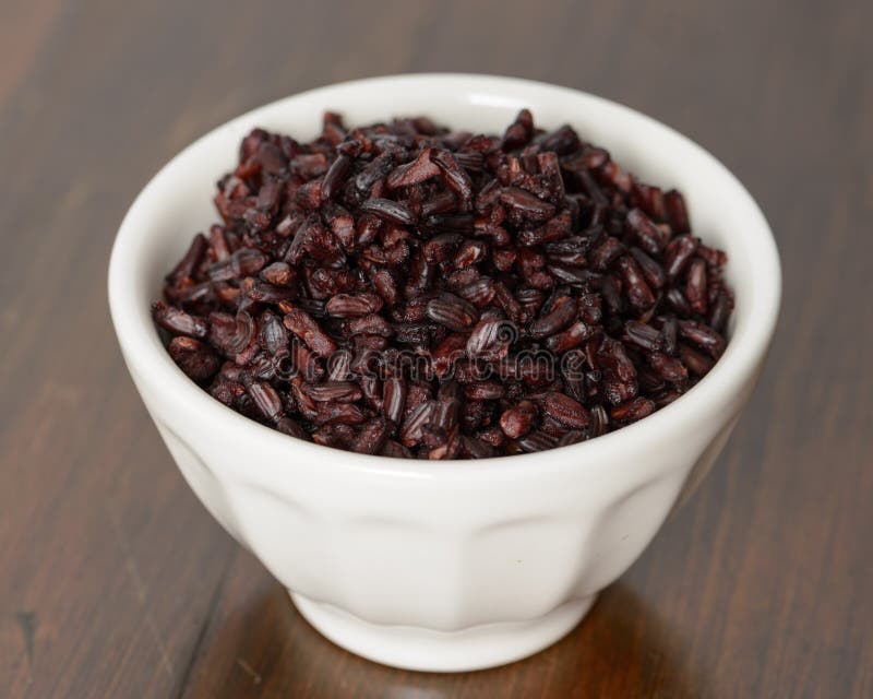Cooked black rice in bowl stock photo. Image of ingredient - 97128208
