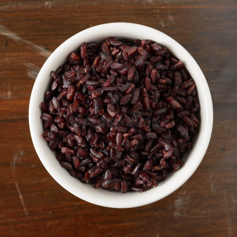 Cooked black rice in bowl stock photo. Image of ingredient - 97128208
