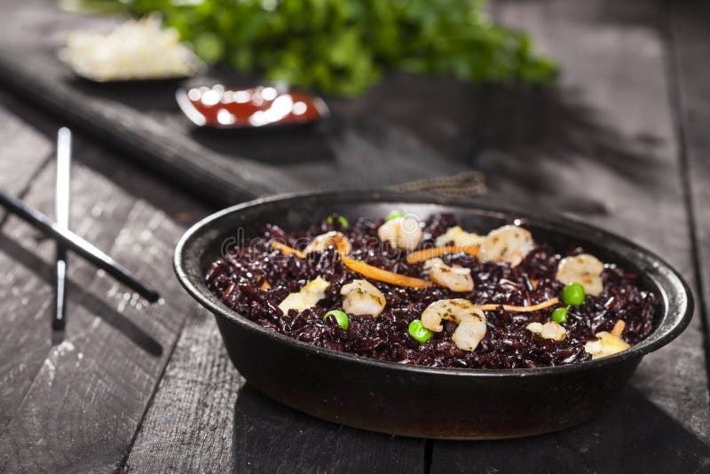 Cooked Black Rice on Blue Plate Stock Image - Image of health, black ...