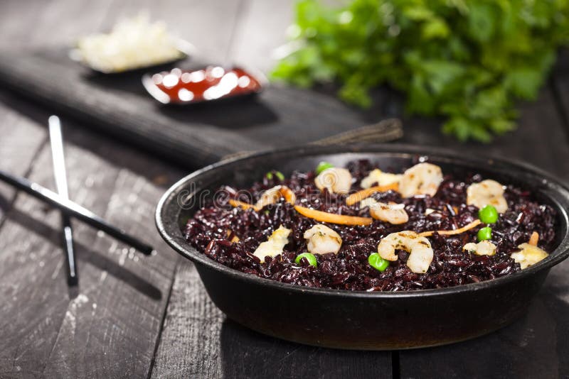 Cooked Black Rice on Blue Plate Stock Image - Image of health, black ...