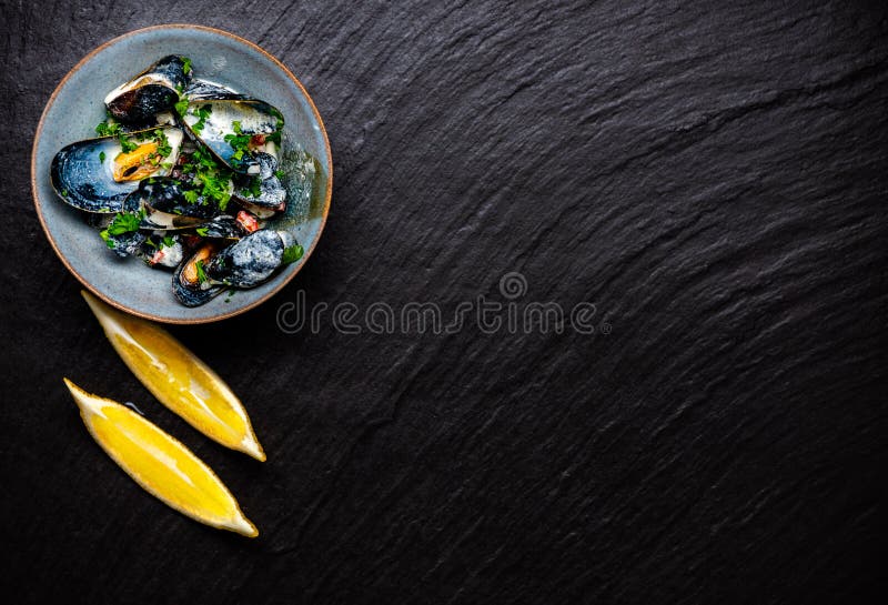 Cooked Blue mussels stock photo. Image of food, dark - 143163290