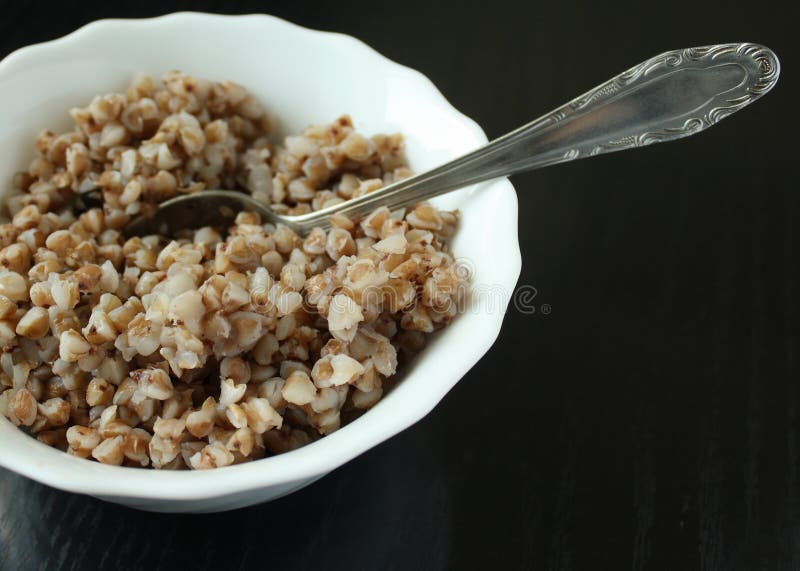 Cooked Buckwheat on the Plate Stock Photo - Image of bowl, spoon: 15357286