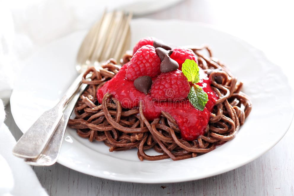 Cooked Chocolate Pasta with Raspberry Sauce Stock Photo - Image of ...