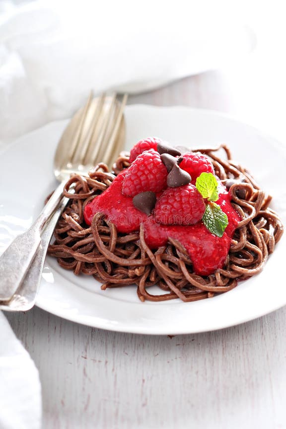 Cooked Chocolate Pasta with Raspberry Sauce Stock Image - Image of ...