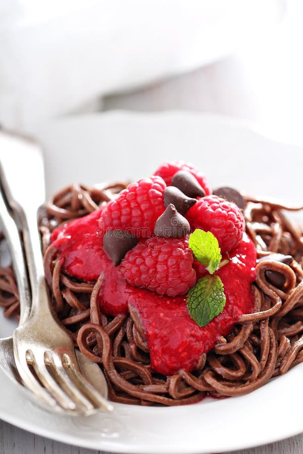 Cooked Chocolate Pasta with Raspberry Sauce Stock Photo - Image of ...