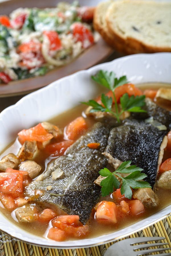 Cooked cod with vegetables stock image. Image of gourmet - 2423065