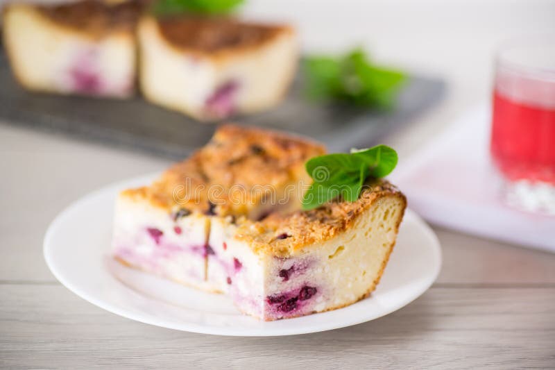 Cooked Cottage Cheese Casserole with Berry Filling in a Plate Stock ...