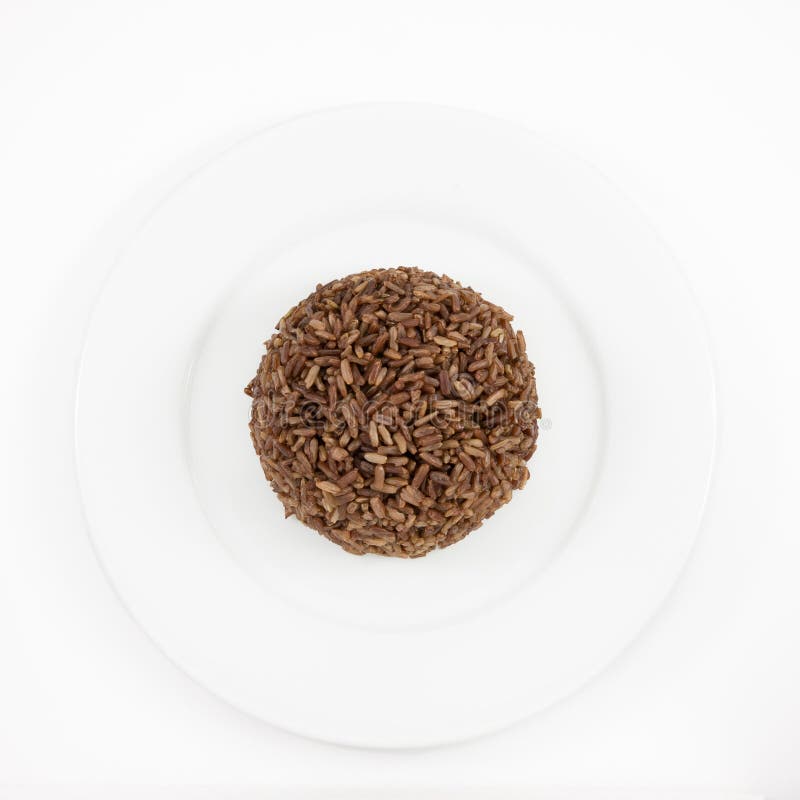 The Cooked Dark Brown Rice on the White Plate Stock Image - Image of ...