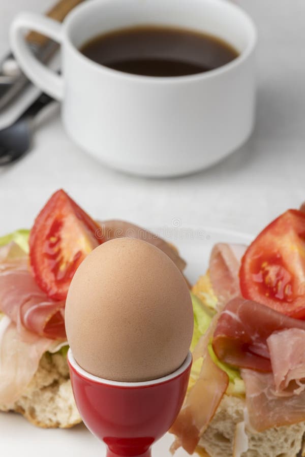 Cooked egg with coffee stock image. Image of boiled - 127634581