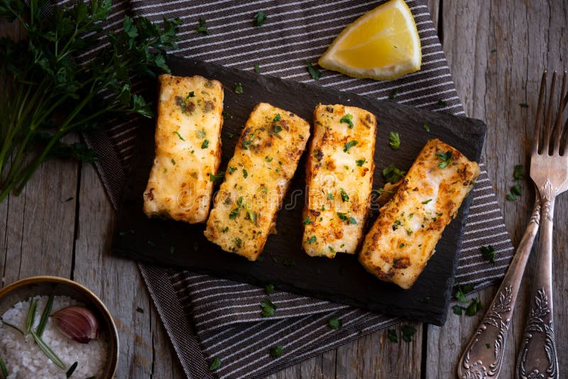 Cooked Fish Fillet with Lemon and Vegetables Stock Photo - Image of ...