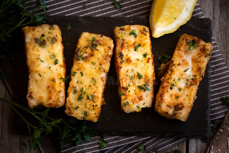 Cooked Fish Fillet with Lemon and Vegetables Stock Photo - Image of ...