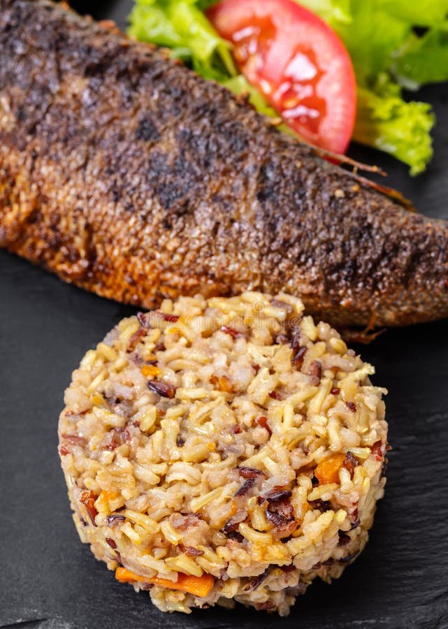 Cooked Fish with Rice and Vegetables Stock Photo - Image of delicious ...