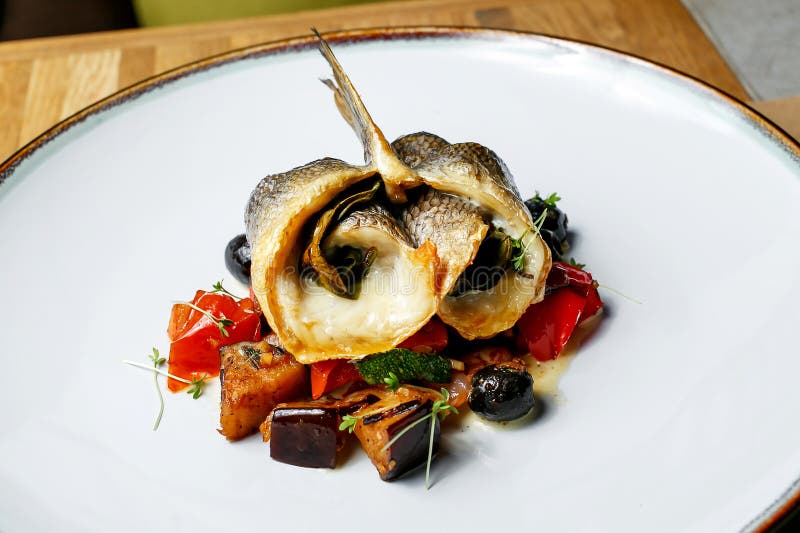 Cooked Fish in a Roll with Vegetables Stock Photo - Image of food ...