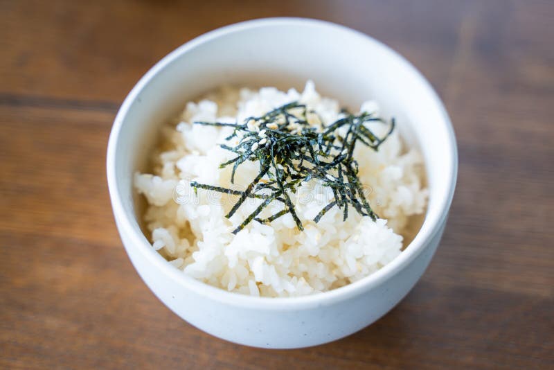 Cooked Japanese Rice with Seaweed and Sesame Stock Photo - Image of ...