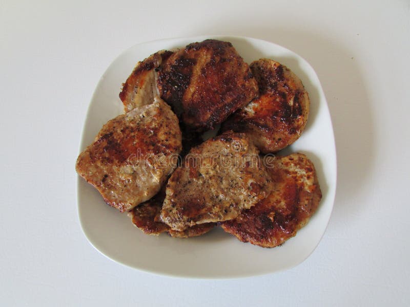Cooked Meat on Square White Plate. Stock Image - Image of square, meat ...