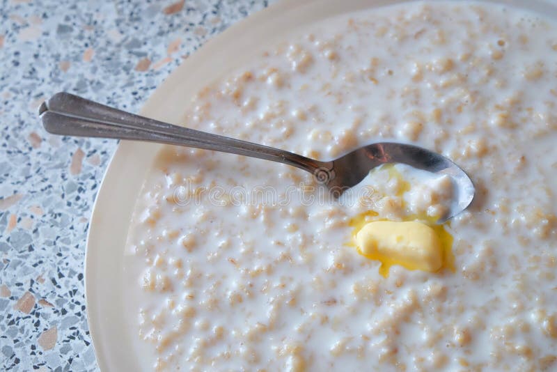Cooked oat flakes stock photo. Image of ceramic, flakes - 111396126