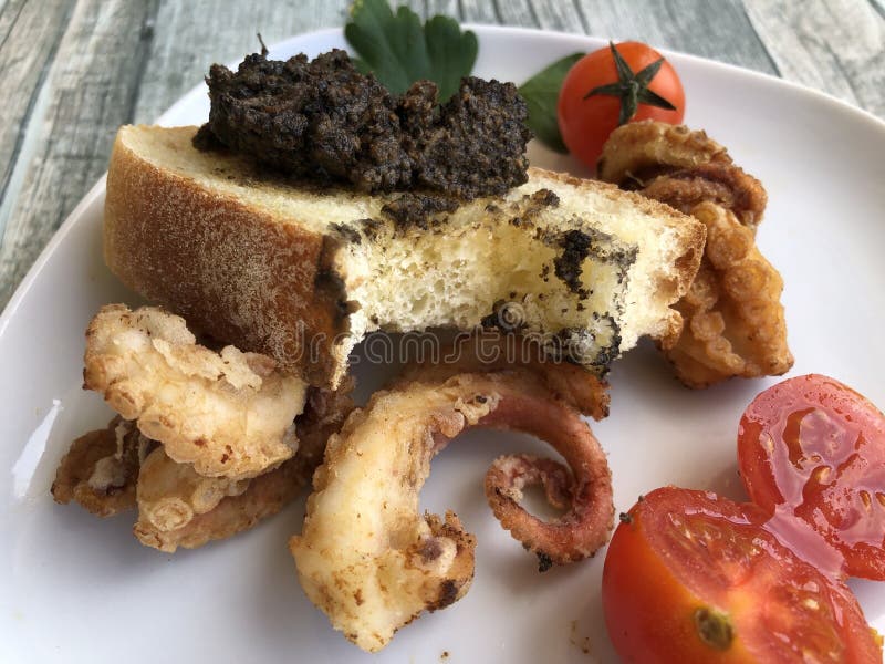 Cooked Octopus Liver on a Toasted Bread Stock Photo - Image of toasted ...