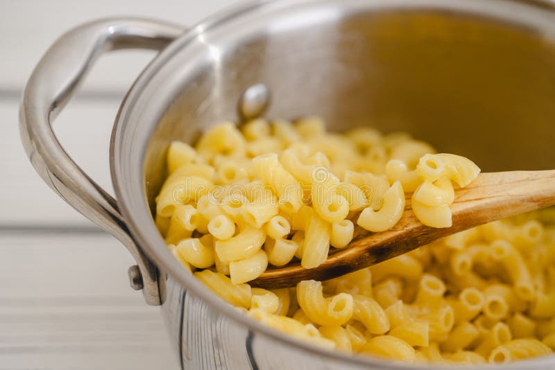 Cooked Pasta in a Pot. Elbows Pasta in a Cooking Pot Close-up Stock ...