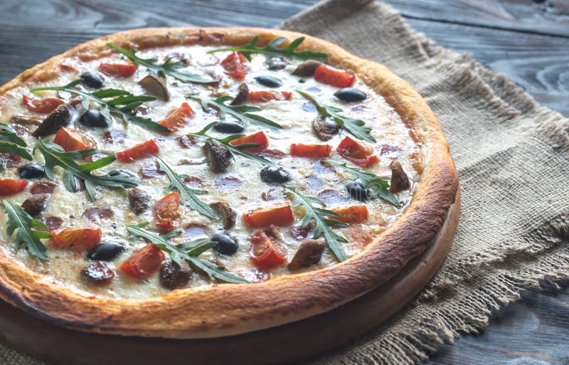 Cooked Pizza with a Glass of Beer Stock Photo - Image of lunch, gourmet ...