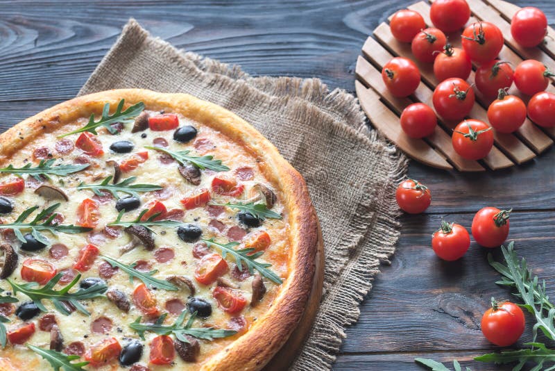 Cooked Pizza with a Glass of Beer Stock Photo - Image of lunch, gourmet ...