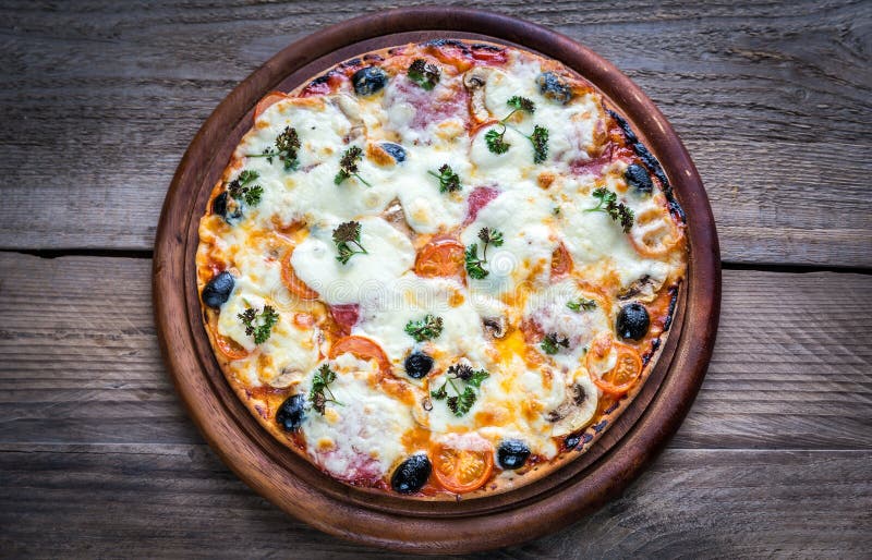 Cooked Pizza with a Glass of Beer Stock Photo - Image of lunch, gourmet ...