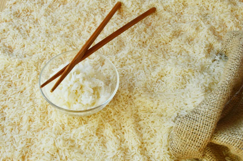Cooked, raw rice stock image. Image of food, sack, sticks - 84548215