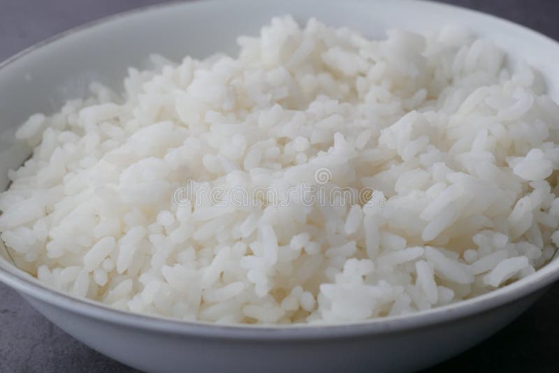 Cooked Rice in a Bowl on Table, Close Up, Stock Photo - Image of rice ...