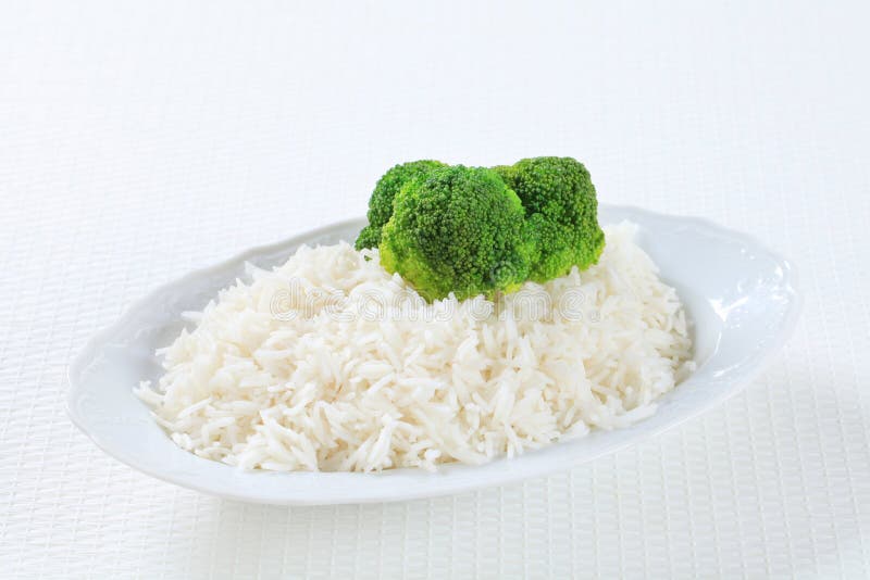 Cooked Rice with broccoli stock image. Image of plate - 25424411