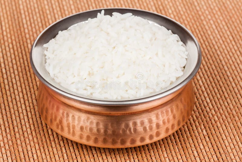 Cooked Rice in Copperware stock image. Image of steamed - 51874053