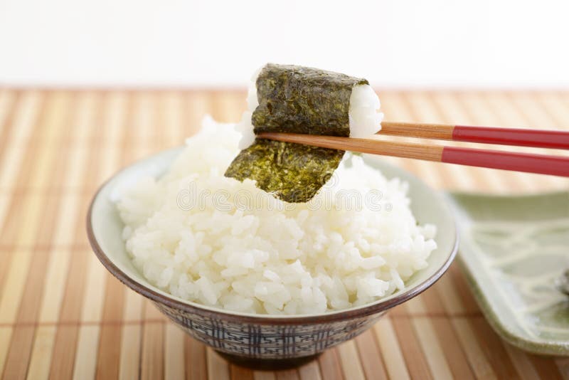 Cooked rice in bowl stock photo. Image of japan, meal - 129784908