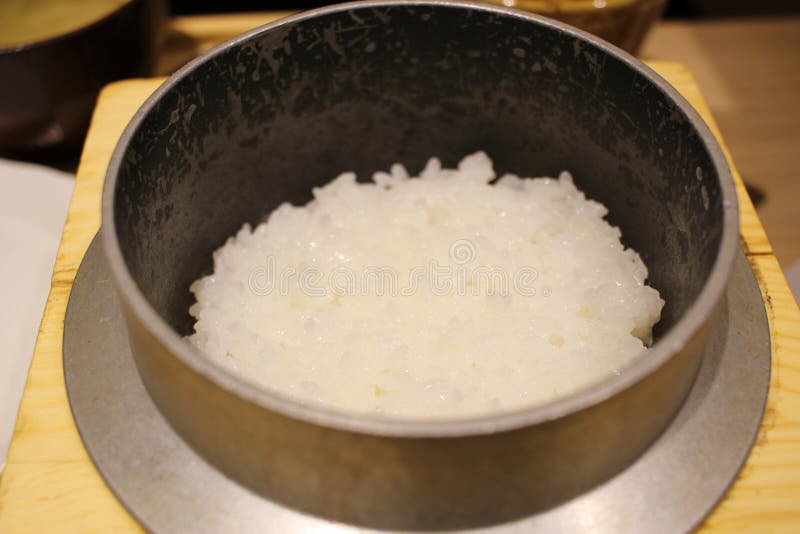 Cooked Rice Grains in Stone Bowl at Japan Stock Photo - Image of macro ...