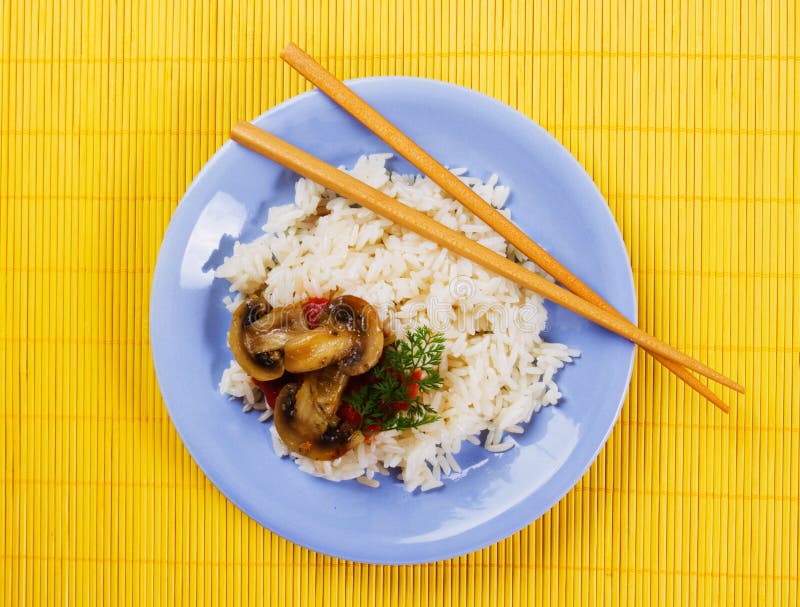 Cooked rice with mushrooms stock image. Image of cuisine - 18144793