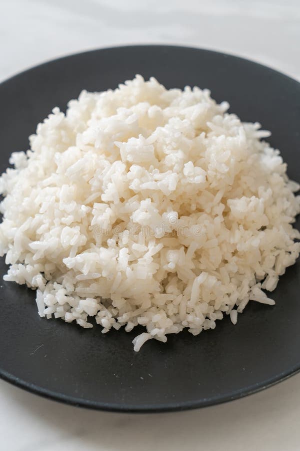 Cooked rice on plate stock photo. Image of bowl, chinese - 193172274