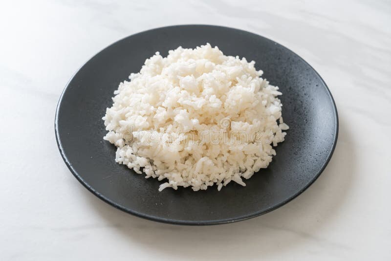 Cooked rice on plate stock photo. Image of diet, health - 193173358