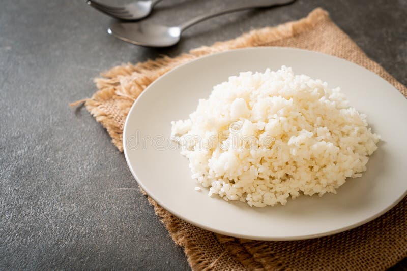 Cooked rice on plate stock photo. Image of carbohydrate - 193173398
