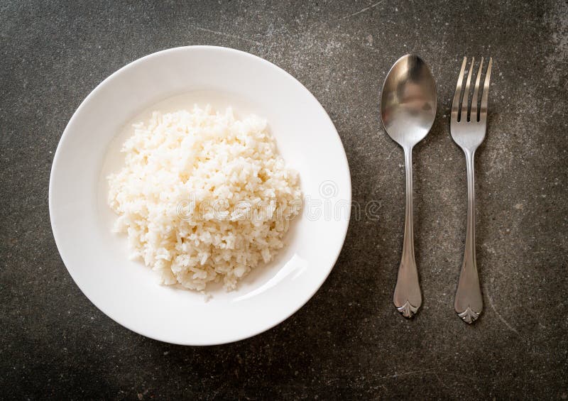 Cooked rice on plate stock photo. Image of lunch, cooking - 193173408