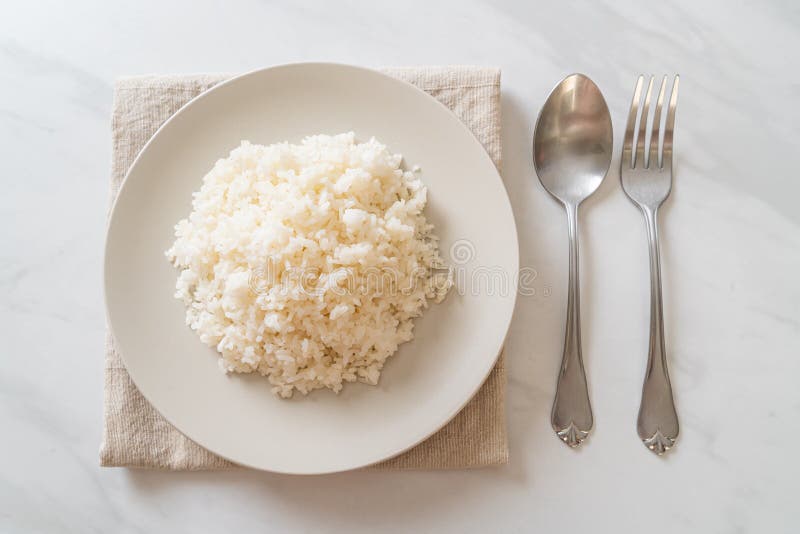 Cooked rice on plate stock photo. Image of background - 242974898
