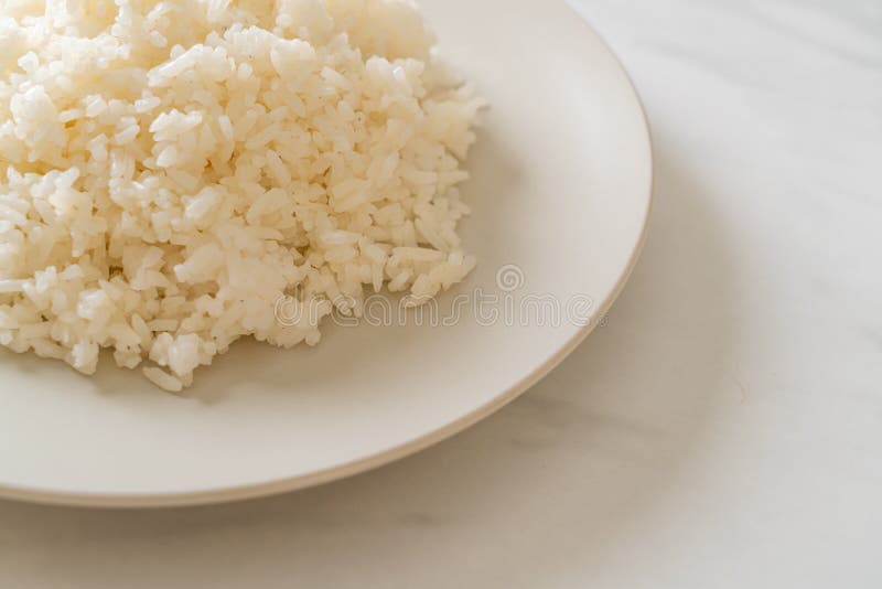 Cooked rice on plate stock photo. Image of food, rice - 193666238