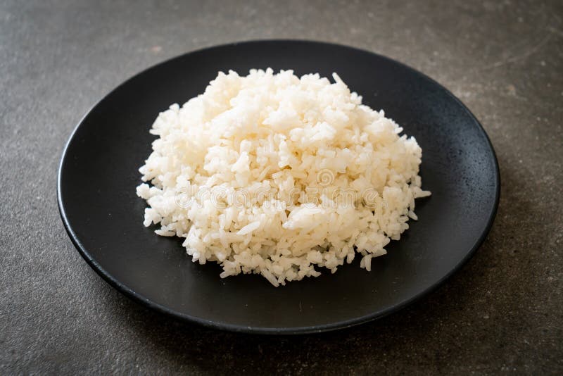 Cooked rice on plate stock photo. Image of background - 242974898