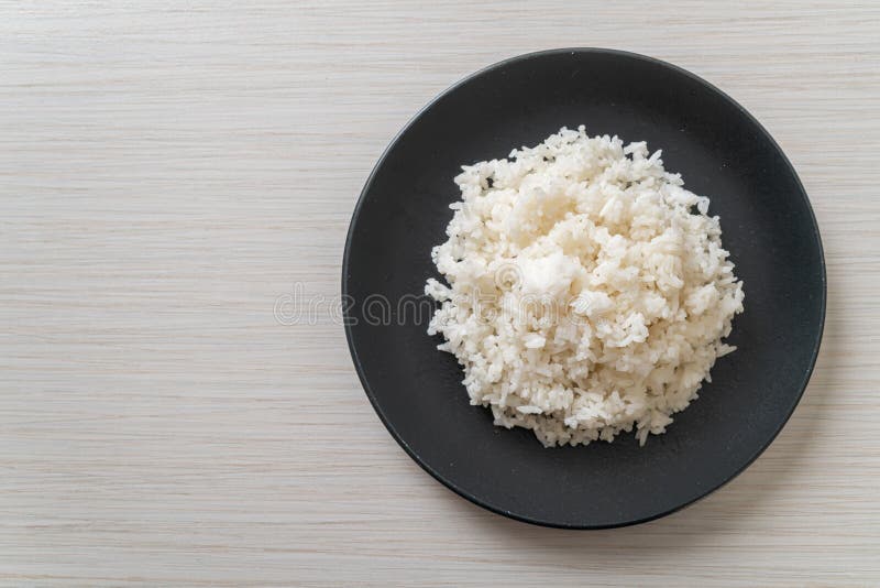 Cooked rice on plate stock photo. Image of cooked, healthy - 195854632