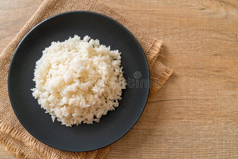 Cooked rice on plate stock photo. Image of bowl, rice - 199012500